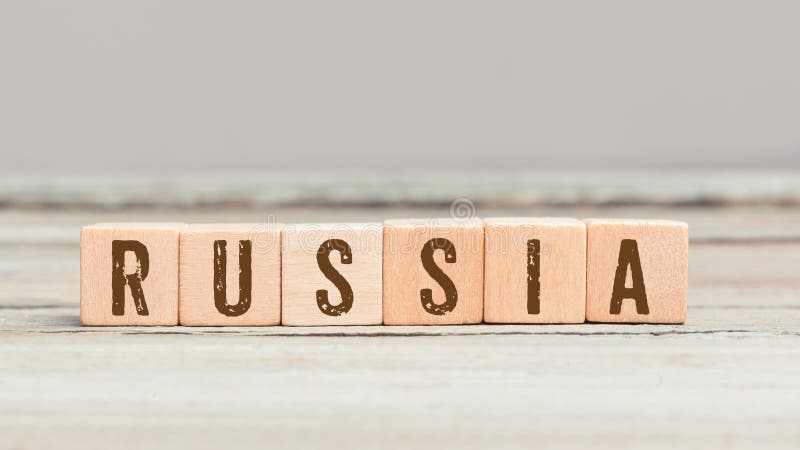 Word Russia on wood cubes stock photo. Image of structure - 242162510