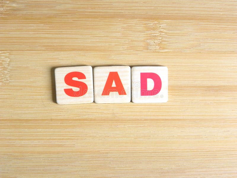 Word Sad on Wood Background Stock Photo - Image of angry, design: 144505348