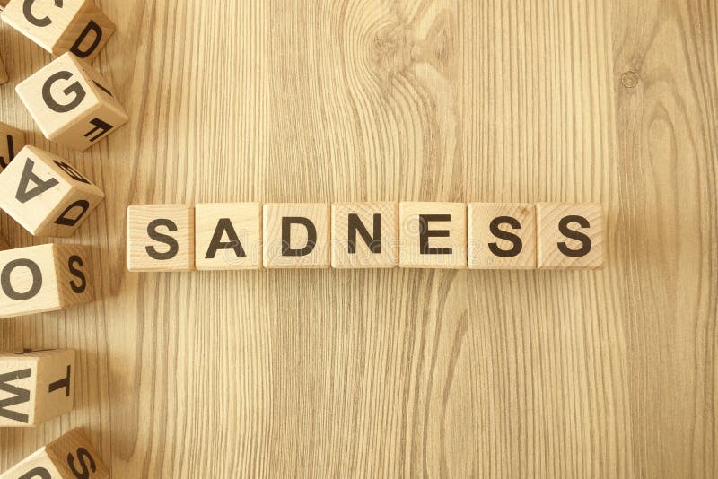 Word Sadness from Wooden Blocks Stock Image - Image of heartache ...