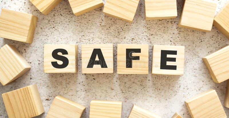 The Word SAFE Consists of Wooden Cubes with Letters, Top View on a ...
