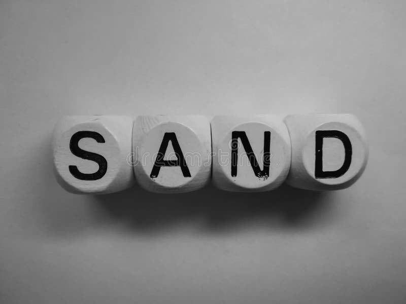 Word sand spelled on dice stock photo. Image of cube - 122885192