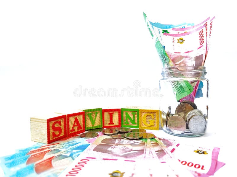 The Word "Saving" is Arranged Using Wooden Blocks on Top of a Pile of ...