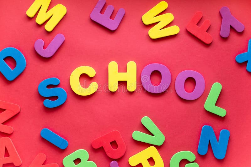 Letters of the Alphabet in Different Colors on a Red Background ...