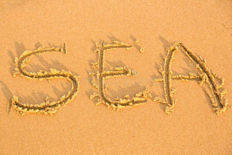 Word Sea on the Yellow Sandy Beach Stock Photo - Image of sunshine ...
