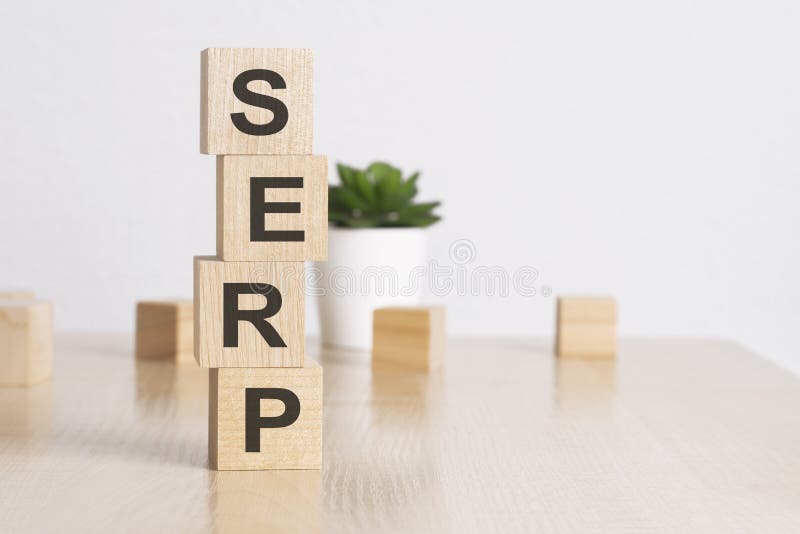 Word SERP with Wood Building Blocks, Light Green Background. Front View ...