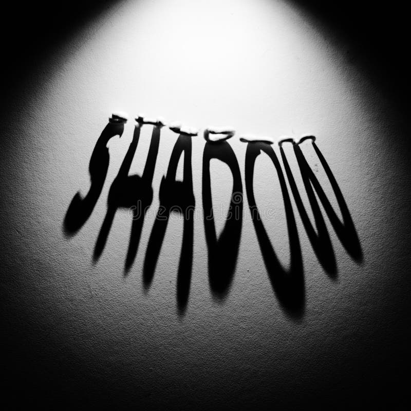 The Word SHADOW is Cast As a Shadow on a Textured, Light Gray Surface ...