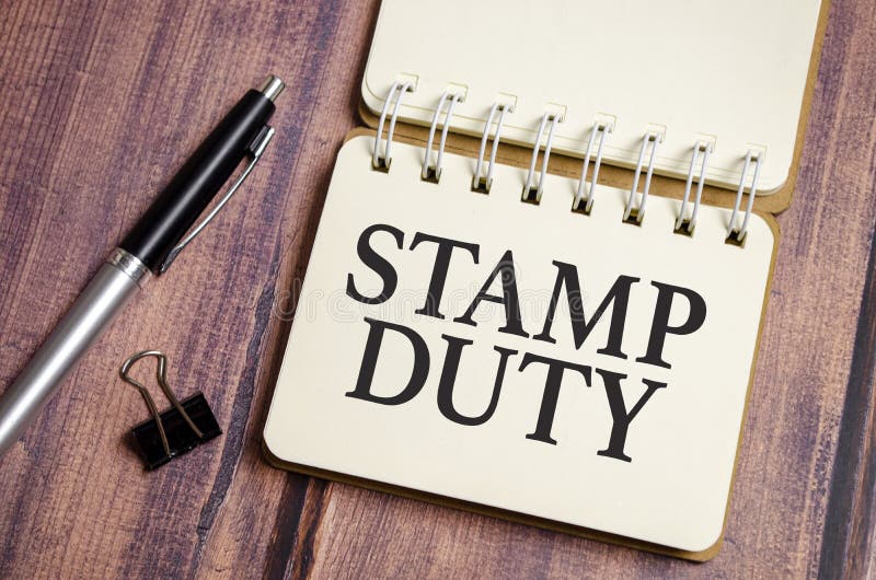 The Word Stamp Duty Written on a Wooden Background Stock Image - Image ...