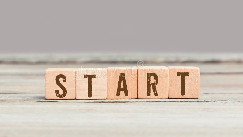 Word Start on wood cubes stock image. Image of letters - 246075231