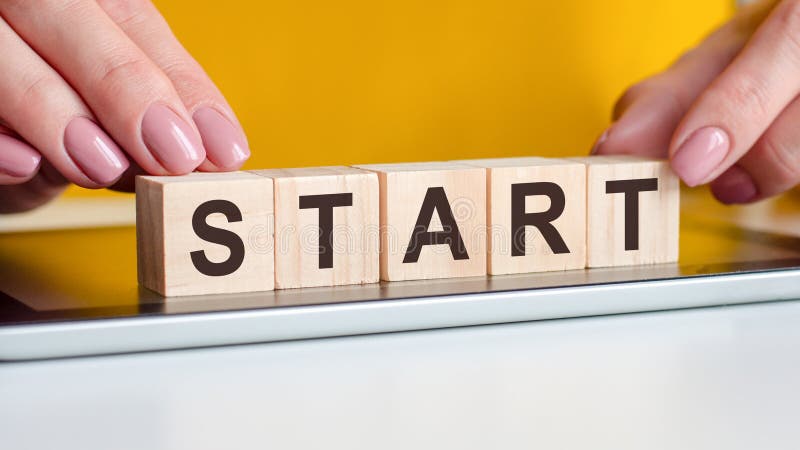 The Word Start is Written on Wooden Cubes, Concept Stock Image - Image ...