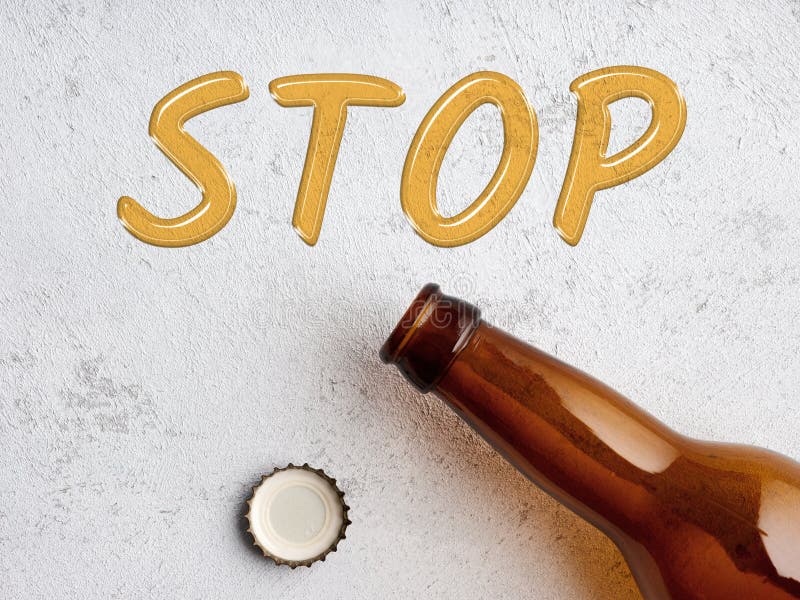The Word Stop in Liquid Form Spilled from the Beer Bottle on White ...