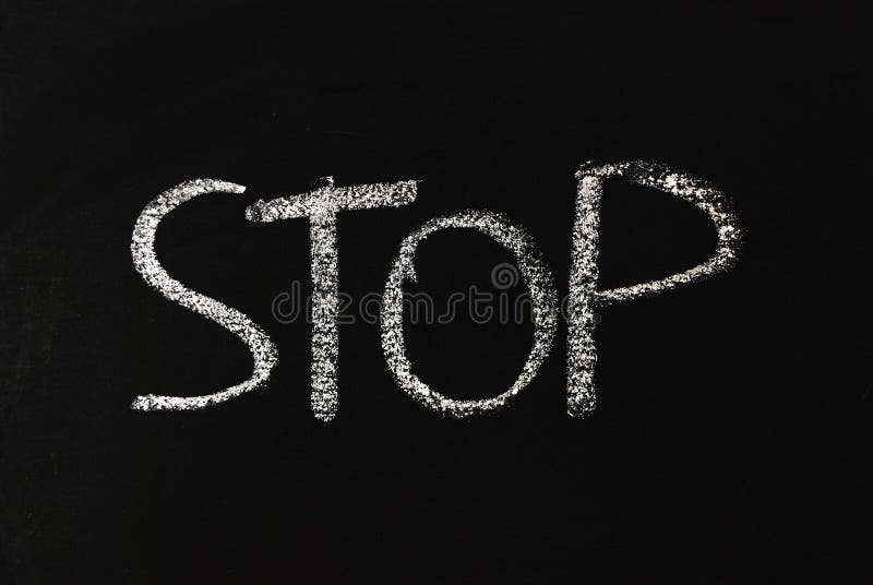 The Word Stop Written in White Chalk on a Black Chalkboard Stock Image ...