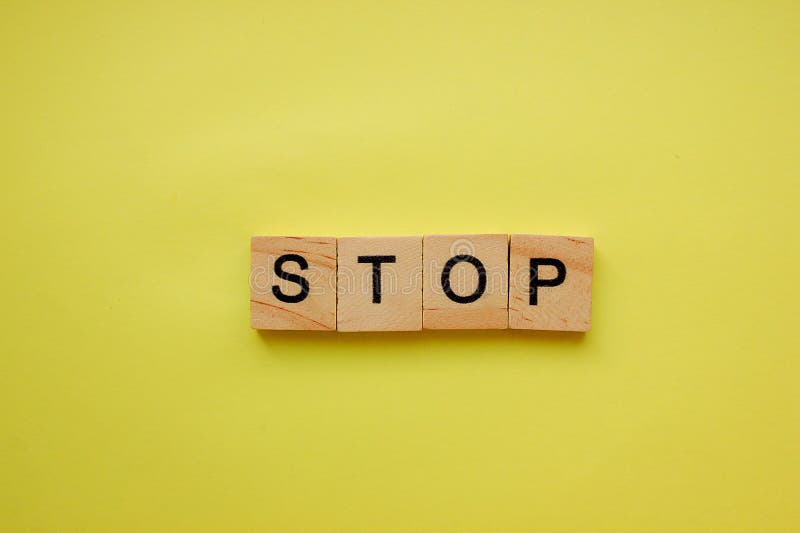 The Word STOP on a Yellow Background. Stock Image - Image of text ...