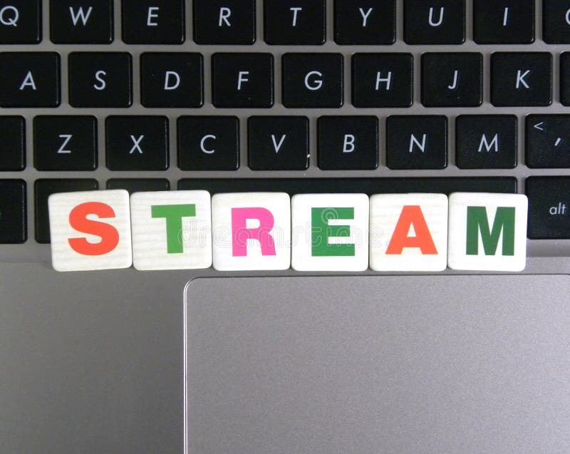 The Word STREAM on a White Computer Keyboard on a Purple Background. E ...