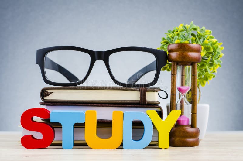 Word STUDY Over Hourglass, and Spectacles on Stacking Book Stock Image ...