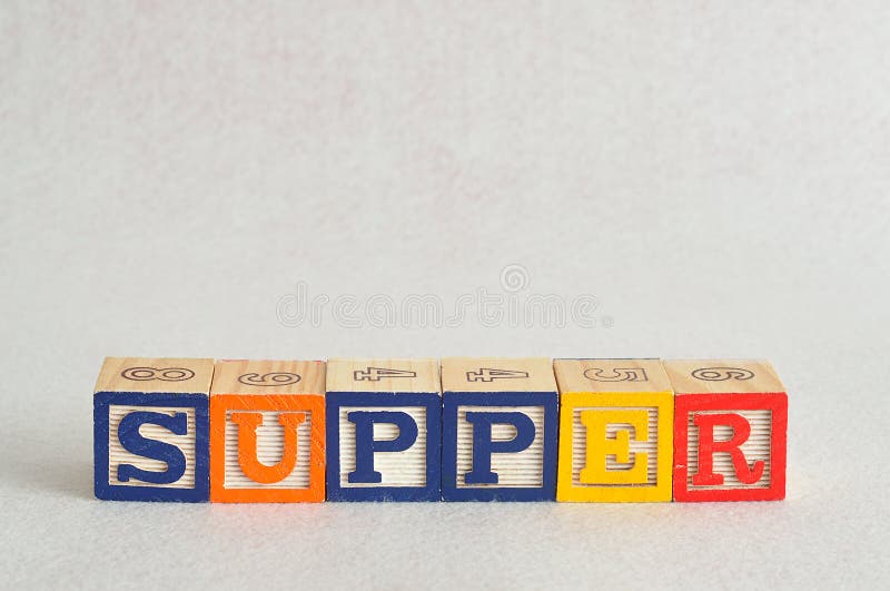 The Word Supper Spelled with Alphabet Blocks Stock Photo - Image of ...