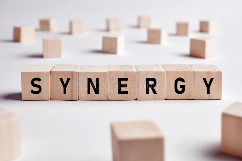 The Word Synergy on Wooden Cubes. Synergy, Cooperation or Efficiency in ... The Word Synergy on Wooden Cubes. Synergy, Cooperation or Efficiency in ...
