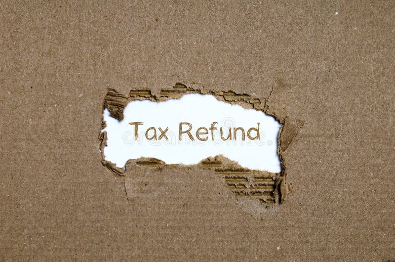 The Word Tax Refund Appearing Behind Torn Paper. Stock Photo - Image of ...