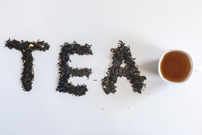 The Word Tea Made with Dry Tea Leafs and a Cup of Black Tea Stock Image ...