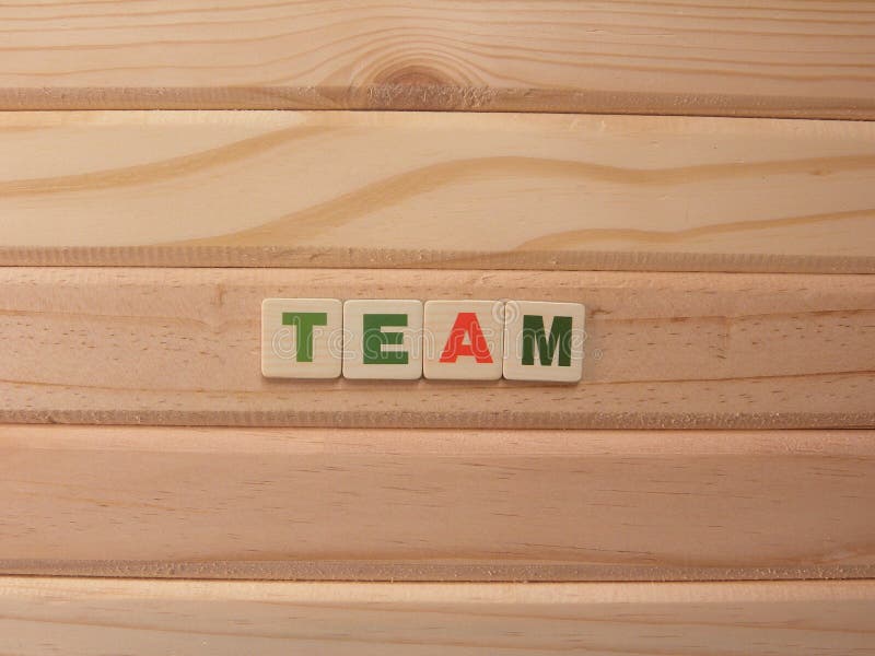 Word Team on wood stock image. Image of abstract, board - 164359197
