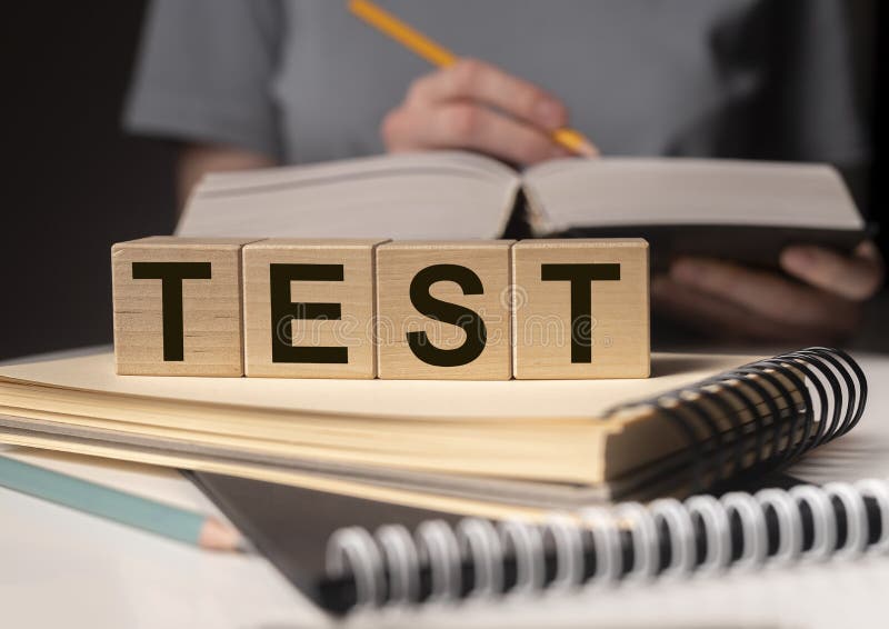 Word Test on Wood Cubes and Student Preparing for it Stock Photo ...