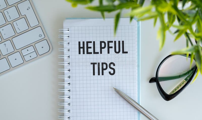 Word Text Helpful Tips on White Paper on Office Table, Business Concept ...
