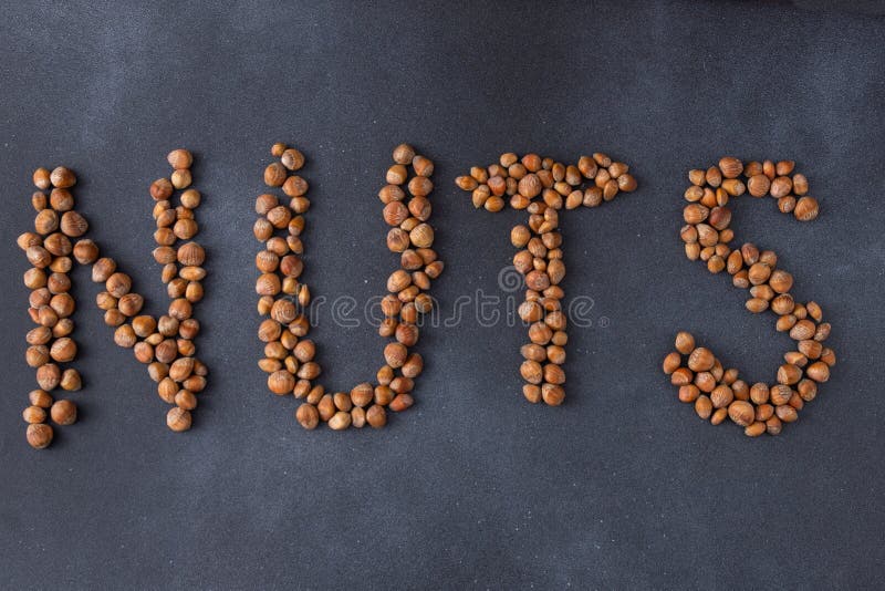 Word Text Nuts. Hazelnut Food Background. Stock Image - Image of ...