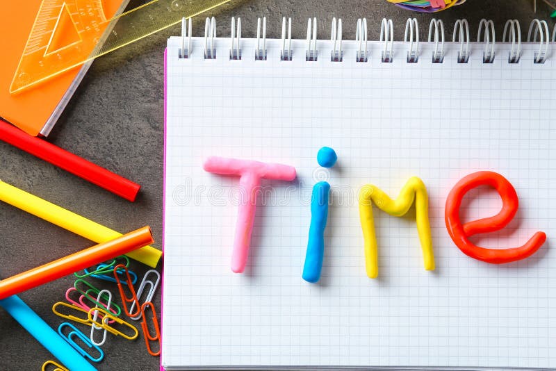 Word TIME Made of Color Plasticine on Notebook Stock Photo - Image of ...