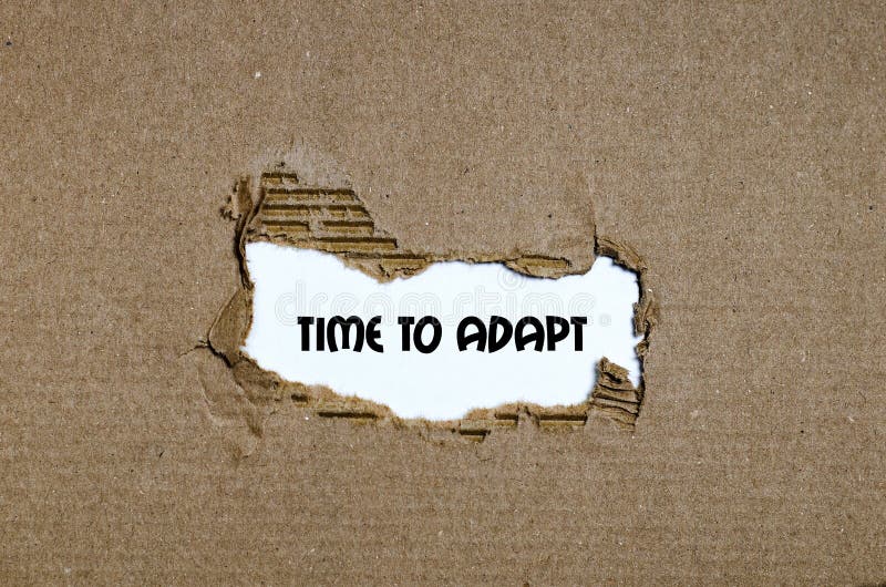 The Word Time To Adapt Appearing Behind Torn Paper Stock Photo - Image ...