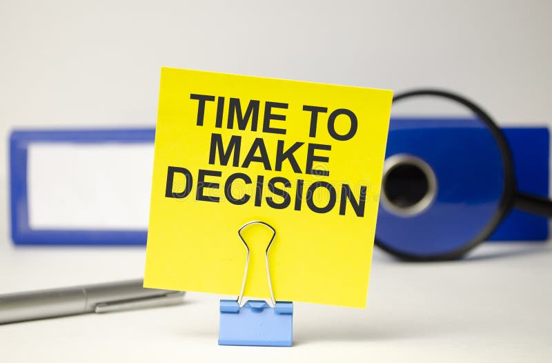 Word TIME To Make Decision on Yellow Sticker and Blue Folder Stock ...