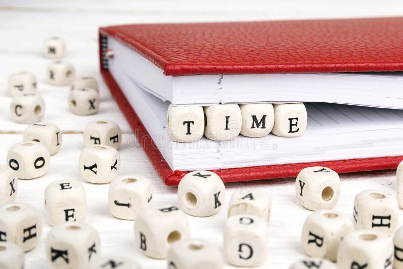 Word Time Written in Wooden Blocks in Red Notebook on White Wood Stock ...