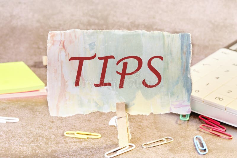 A Word TIPS on a Colored Piece of Paper in a Clothespin Stock Photo ...