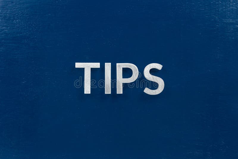 The Word Tips Laid with Silver Letters on Blue Color Surface Stock ...