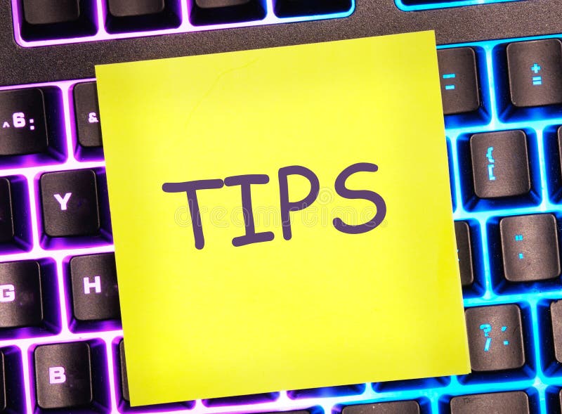 A Word TIPS on a Yellow Sticker on a Colored Backlit Keyboard Stock ...