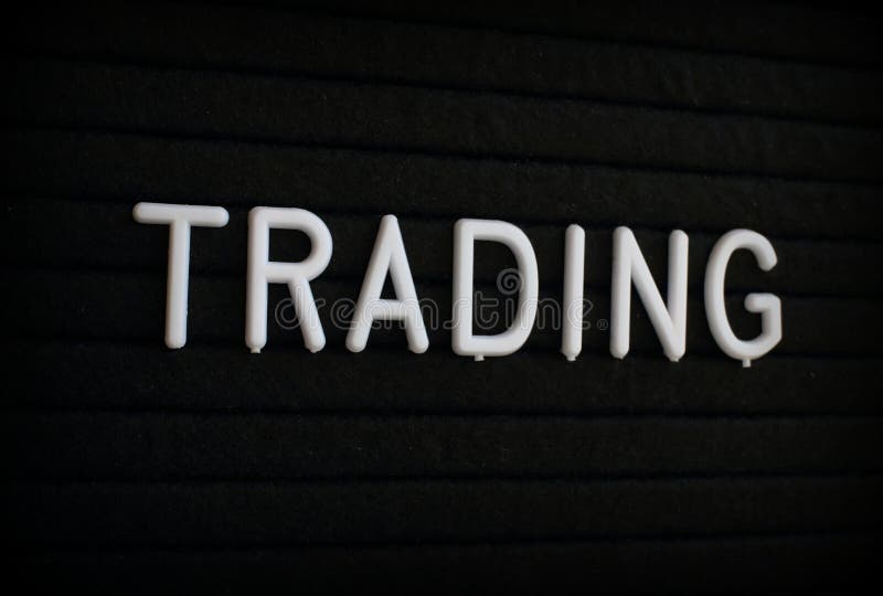The Word Trading on a Letter Board Stock Photo - Image of trading, felt ...