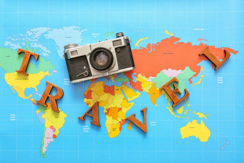 Word "Travel " and Photo Camera on World Map Stock Photo - Image of ...