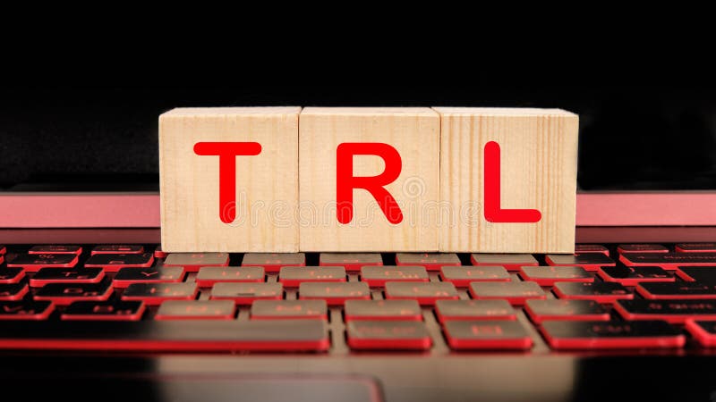The Word TRL is Made of Wooden Blocks on a Laptop Keyboard Stock Image ...