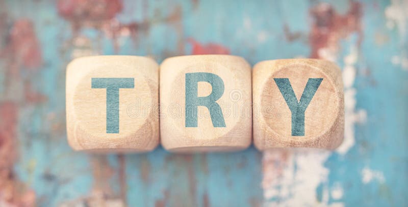 The Word Try on Wooden Cubes Stock Photo - Image of bright, goal: 196981066