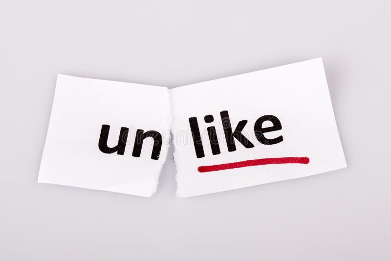 The Word Unlike Changed To Like on Torn Paper Stock Photo - Image of ...