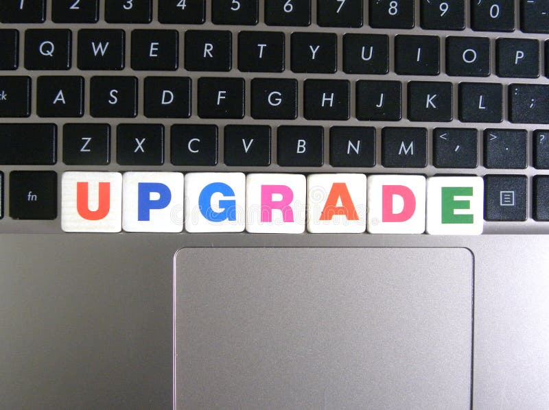 The Word Upgrade Formed by Wooden Blocks on a White Table, Reminder ...