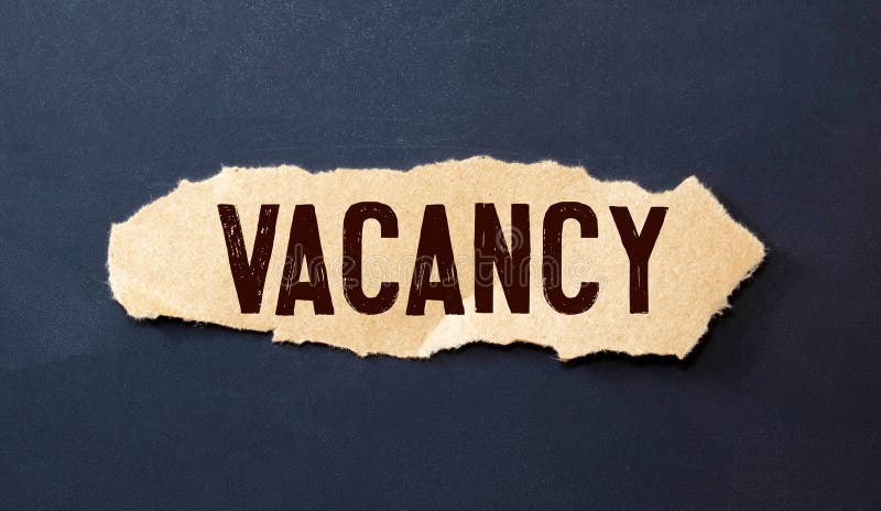 The Word Vacancy of Wooden Letters and a Magnifying Glass Stock Image ...