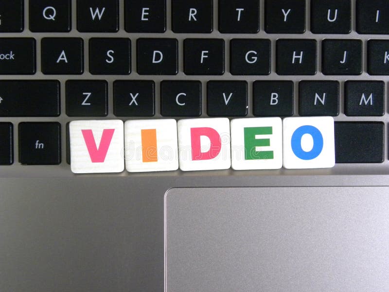 Word Video Written In Wooden Blocks In Red Notebook On White Woo Stock ...