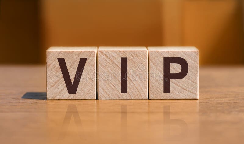 The Word VIP Consists of Wooden Cubes with Letters, Side View on a ...