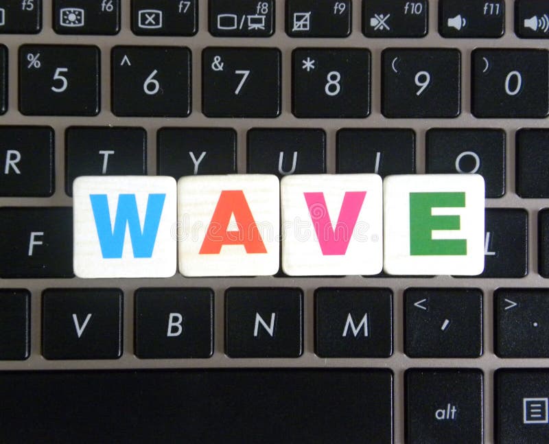 Word WAVE on the beach stock image. Image of edge, letter - 25535191