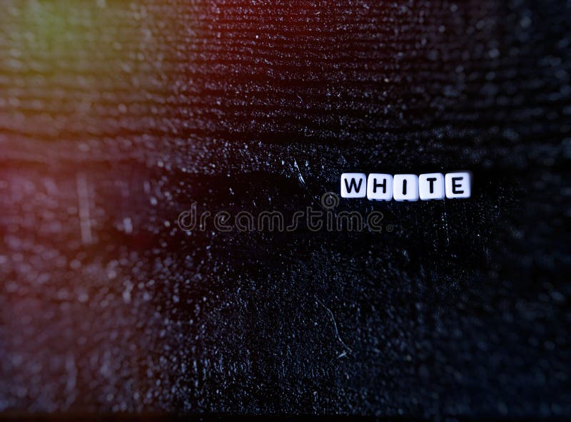 The Word `white` Made of Cubes on a Black Wooden Background. Black ...