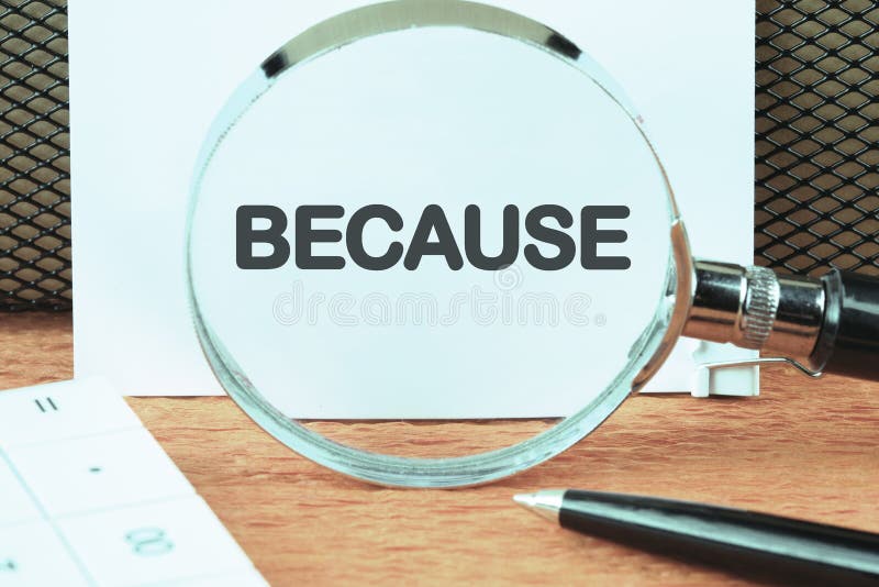 Word because on a White Sheet through a Magnifying Glass, Close-up ...