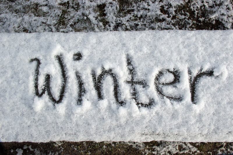 Word Winter Written on a Bench Covered with Snow Stock Photo - Image of ...