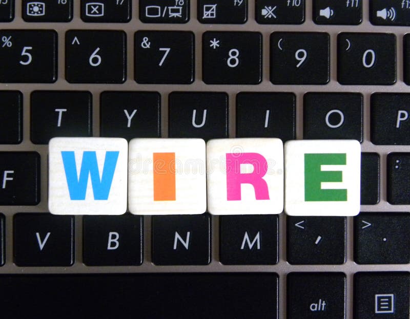 Word wire spelled on dice stock image. Image of type - 122392309