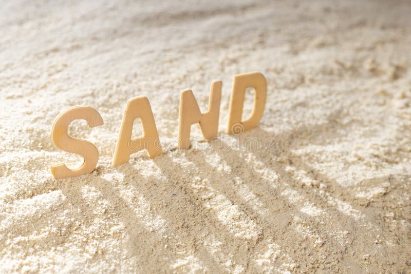Word from Wooden Letters Sand Stock Image - Image of grunge, text ...