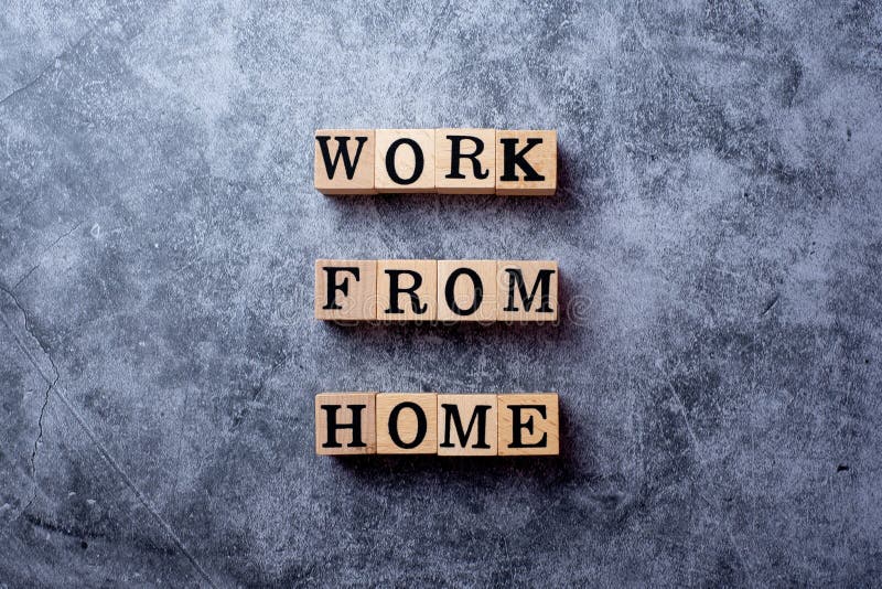 The Word WORK from HOME on Wooden Block and Placed on Black Cement ...