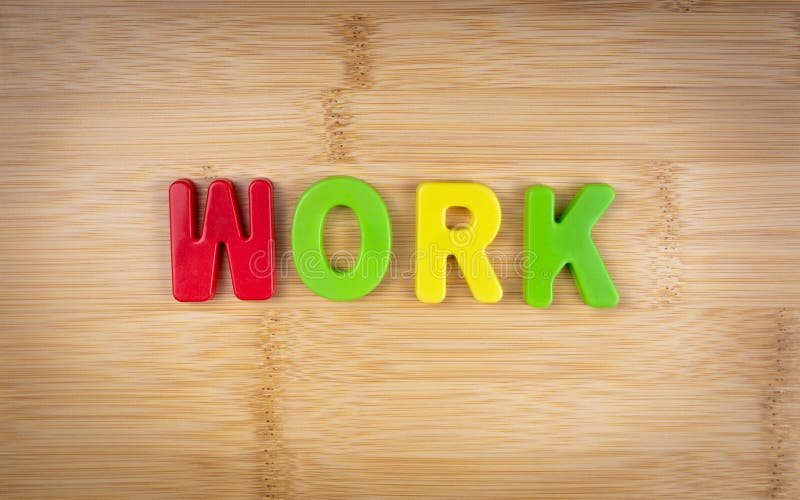 The Word Work is Laid Out of Multicolored Letters on a Table Background ...